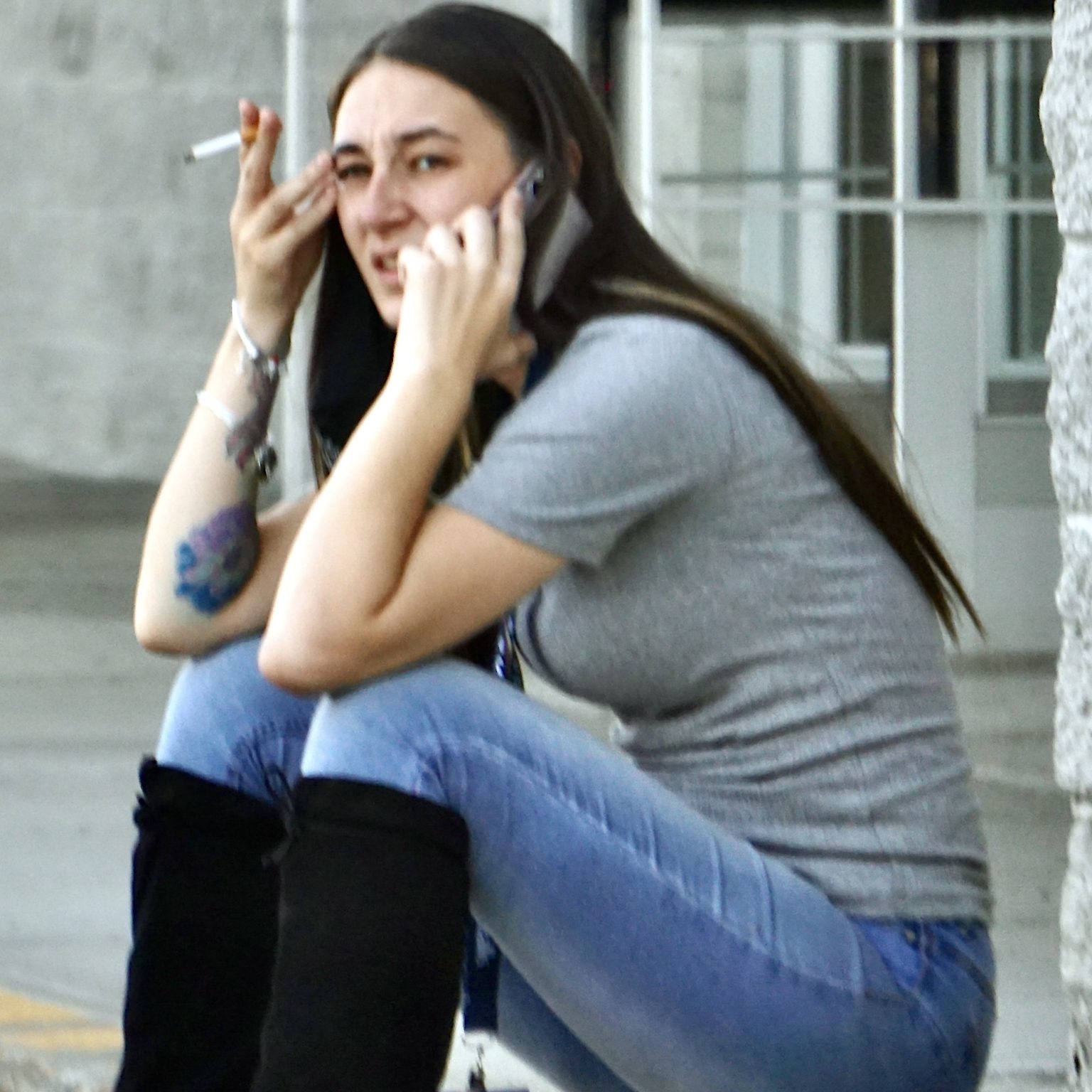 Black hair, jeans, and boots smoker – Smoking Hotties